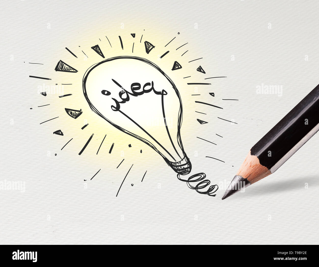 Pencil drawing new idea bulb on white paper Stock Photo - Alamy