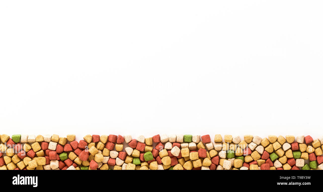 dry animal pet food isolated on white background Stock Photo - Alamy