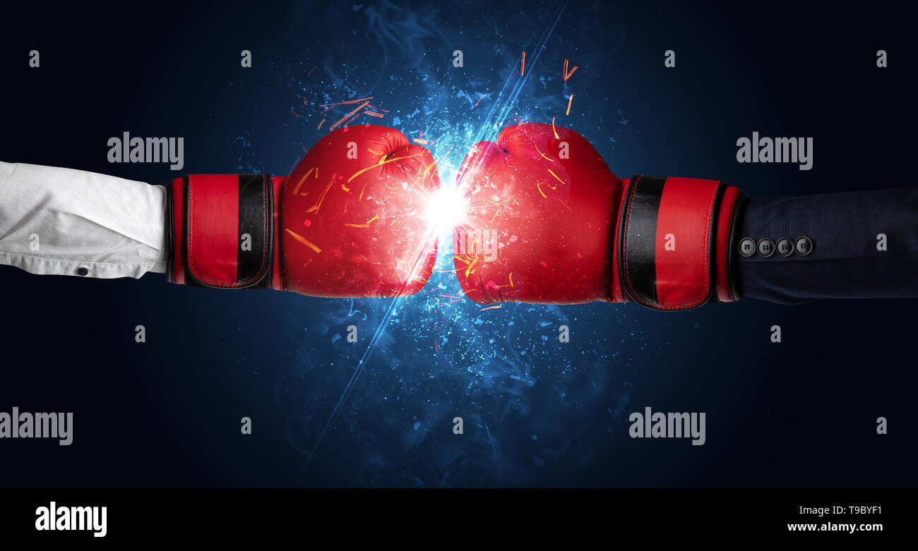 Two hands fighting with light, glow, spark and smoke concept Stock ...