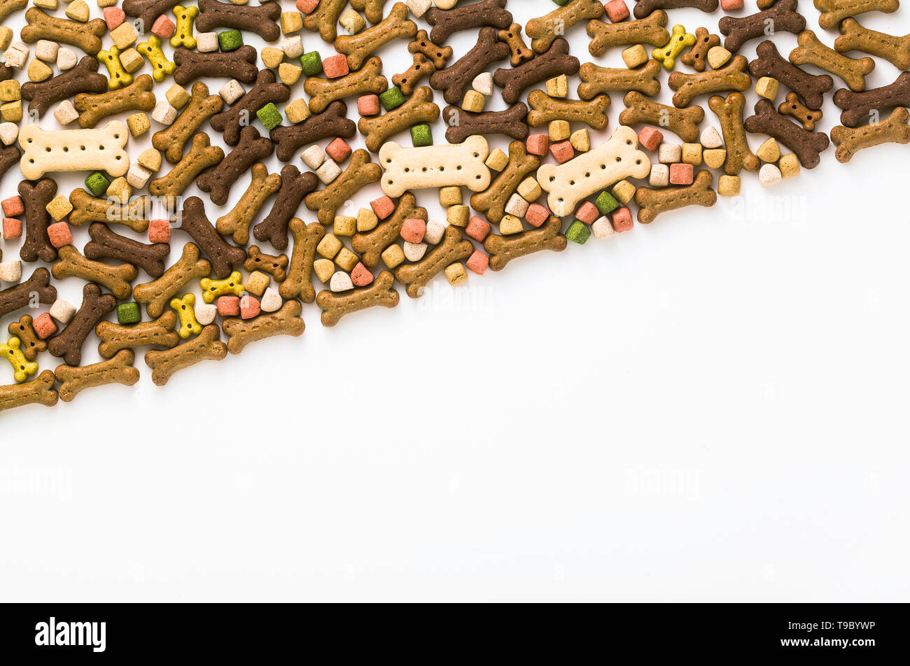 dry animal pet food isolated on white background Stock Photo - Alamy