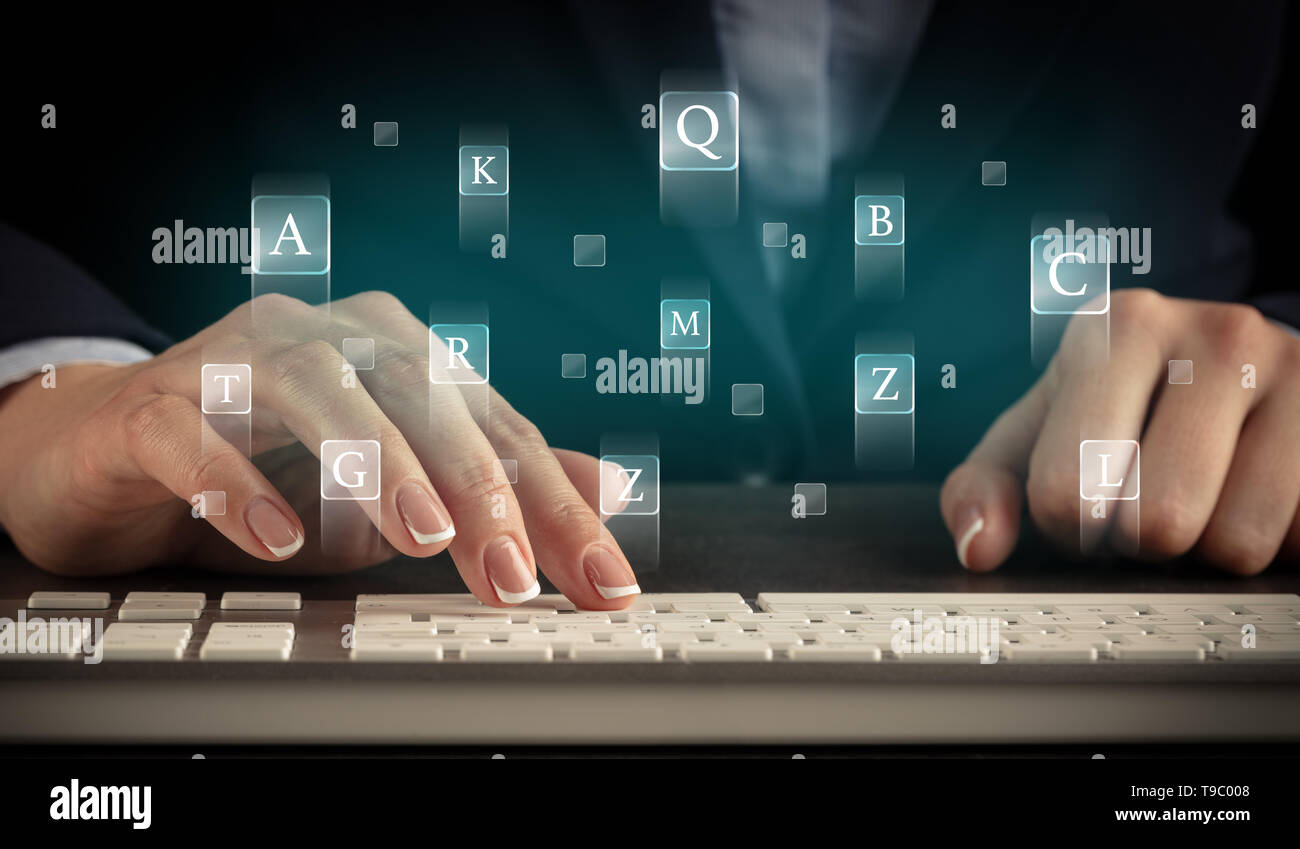 Business woman typing on keyboard with letters around Stock Photo - Alamy