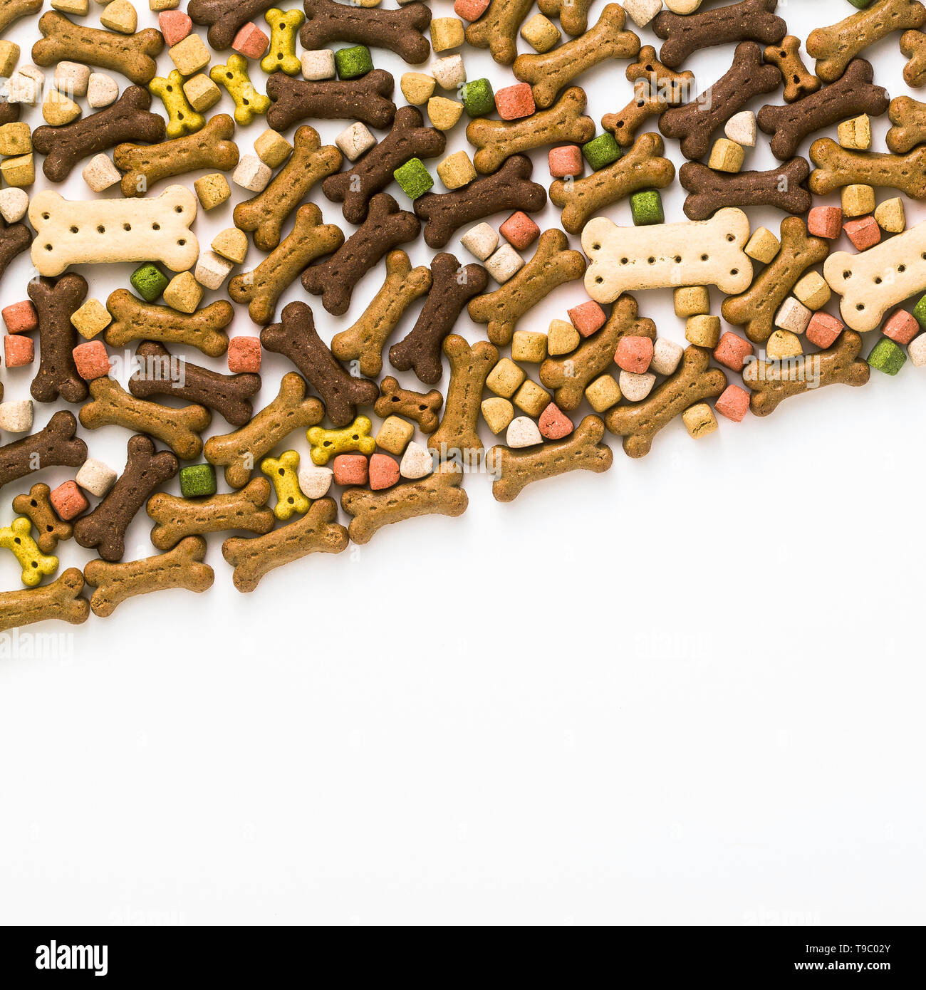 dry animal pet food isolated on white background Stock Photo - Alamy