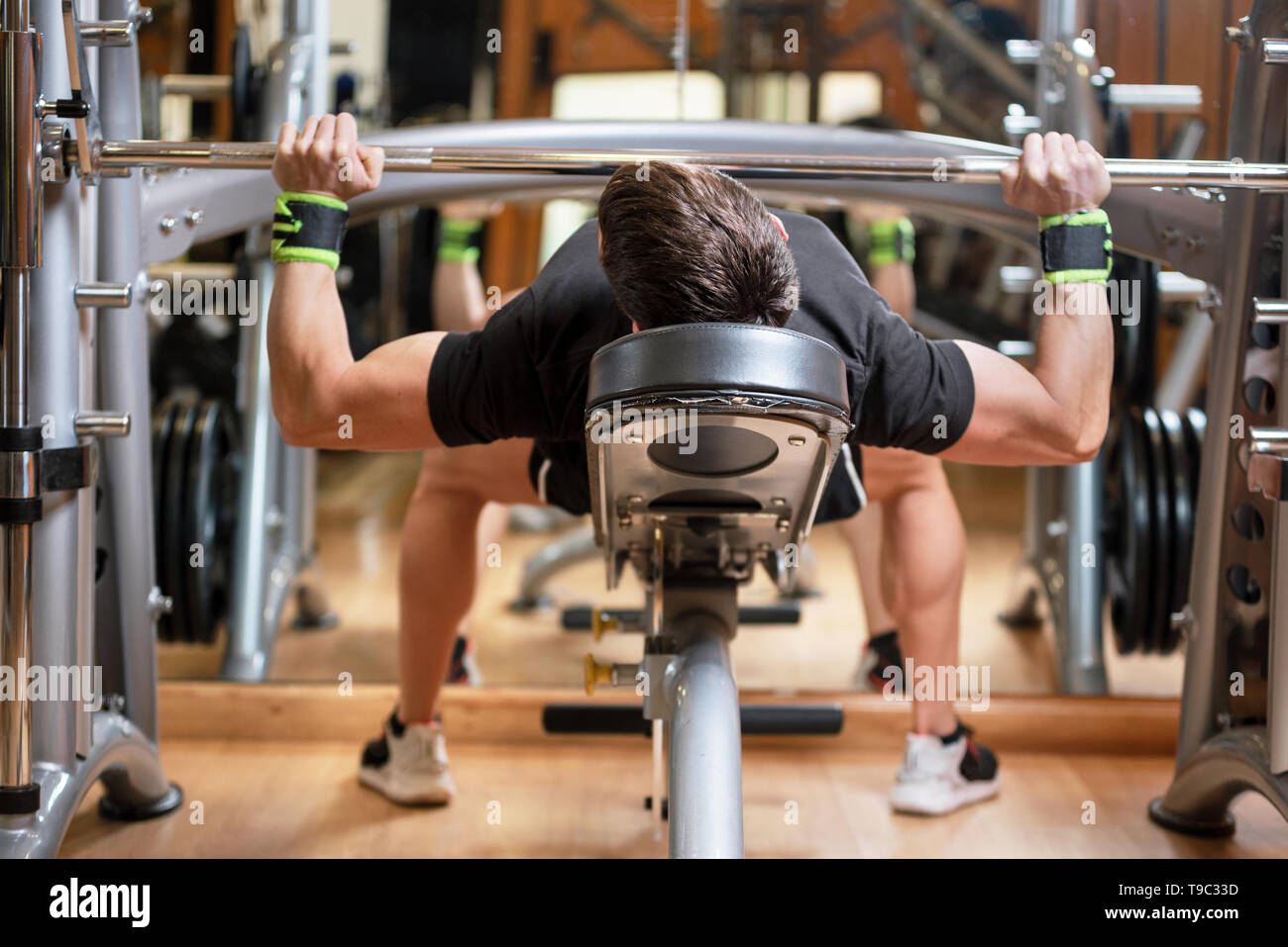 sport, bodybuilding, lifestyle and people concept - young man with ...