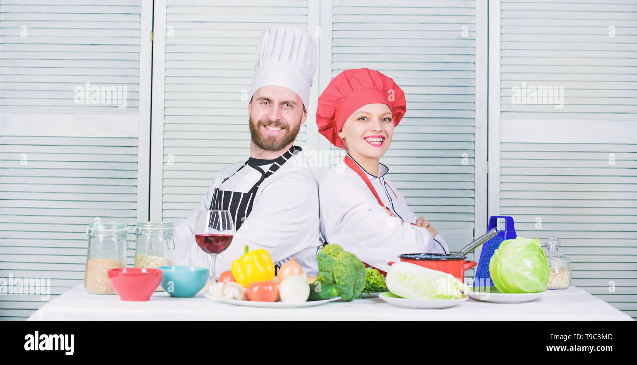 Kitchen rules. man and woman chef in restaurant. Dieting and vitamin ...