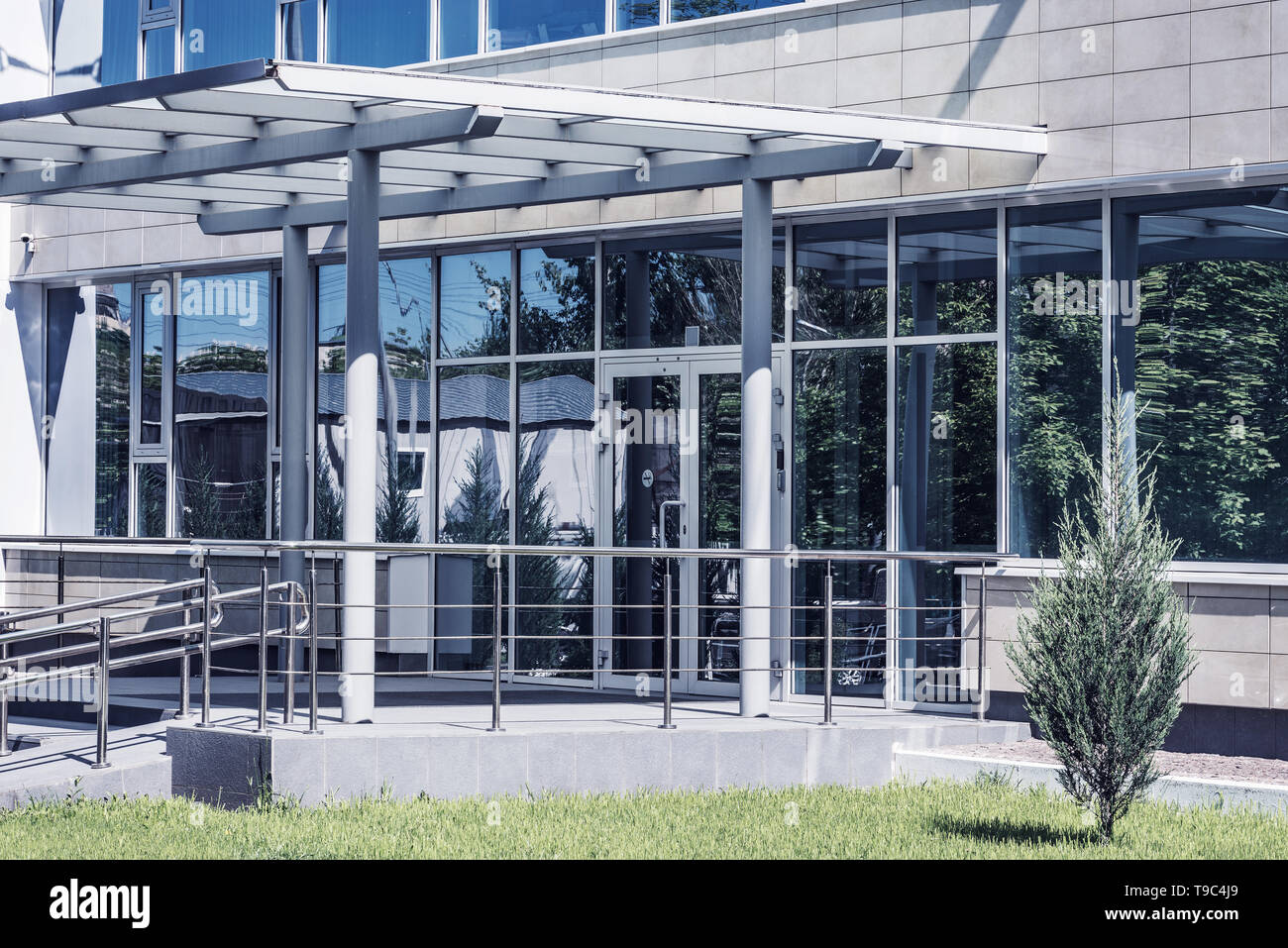 Entrance of the modern business city office building Stock Photo - Alamy