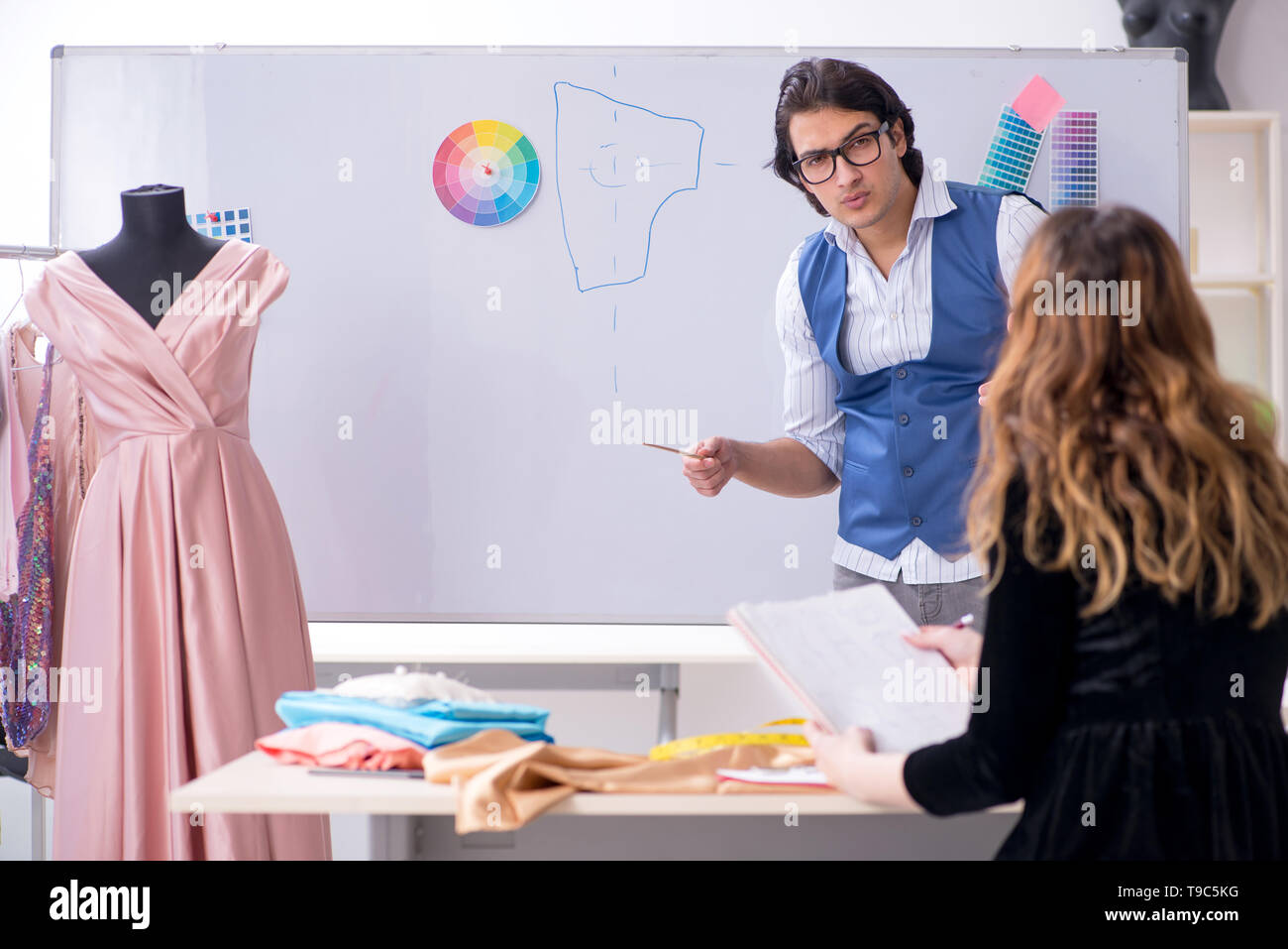 Female teacher tailoring course hi-res stock photography and images - Alamy