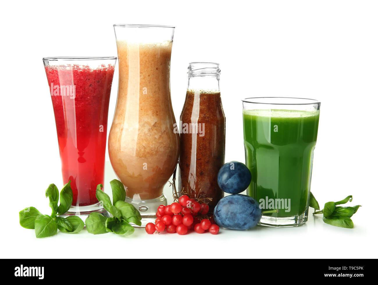 Colourful smoothies on white background Stock Photo - Alamy