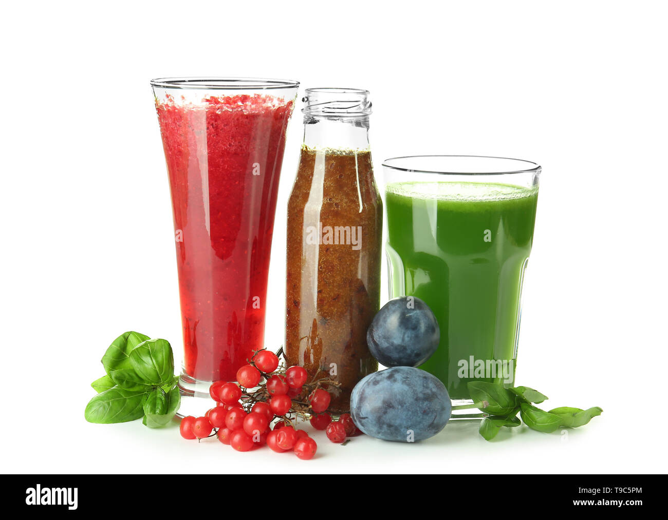 Colourful smoothies on white background Stock Photo - Alamy