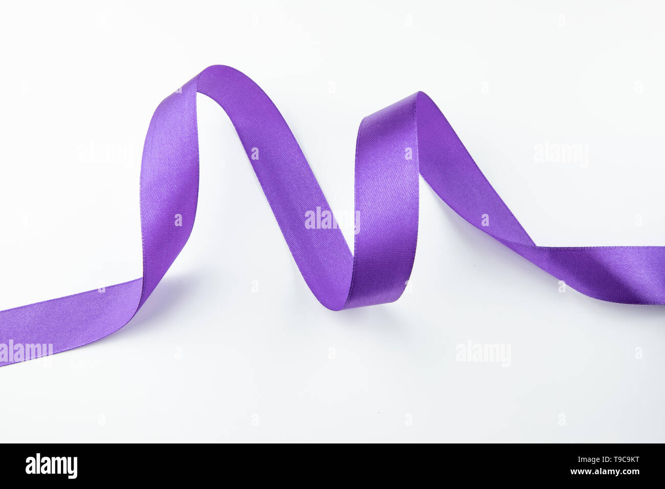 Shiny violet ribbon on white background with copy space Stock Photo - Alamy