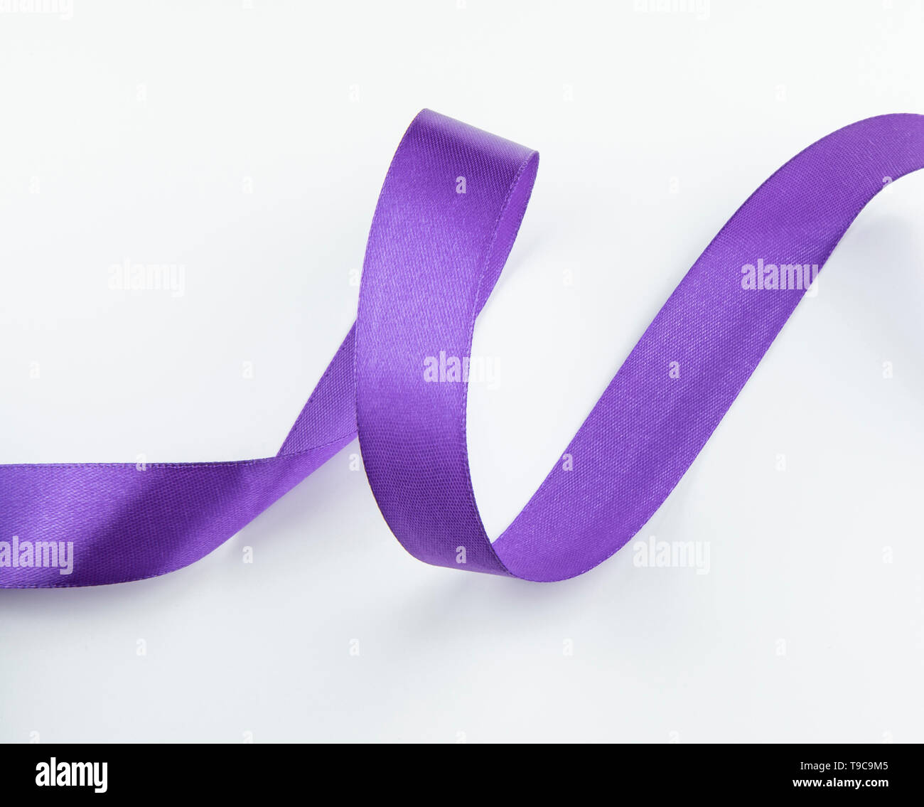 Shiny violet ribbon on white background with copy space Stock Photo - Alamy