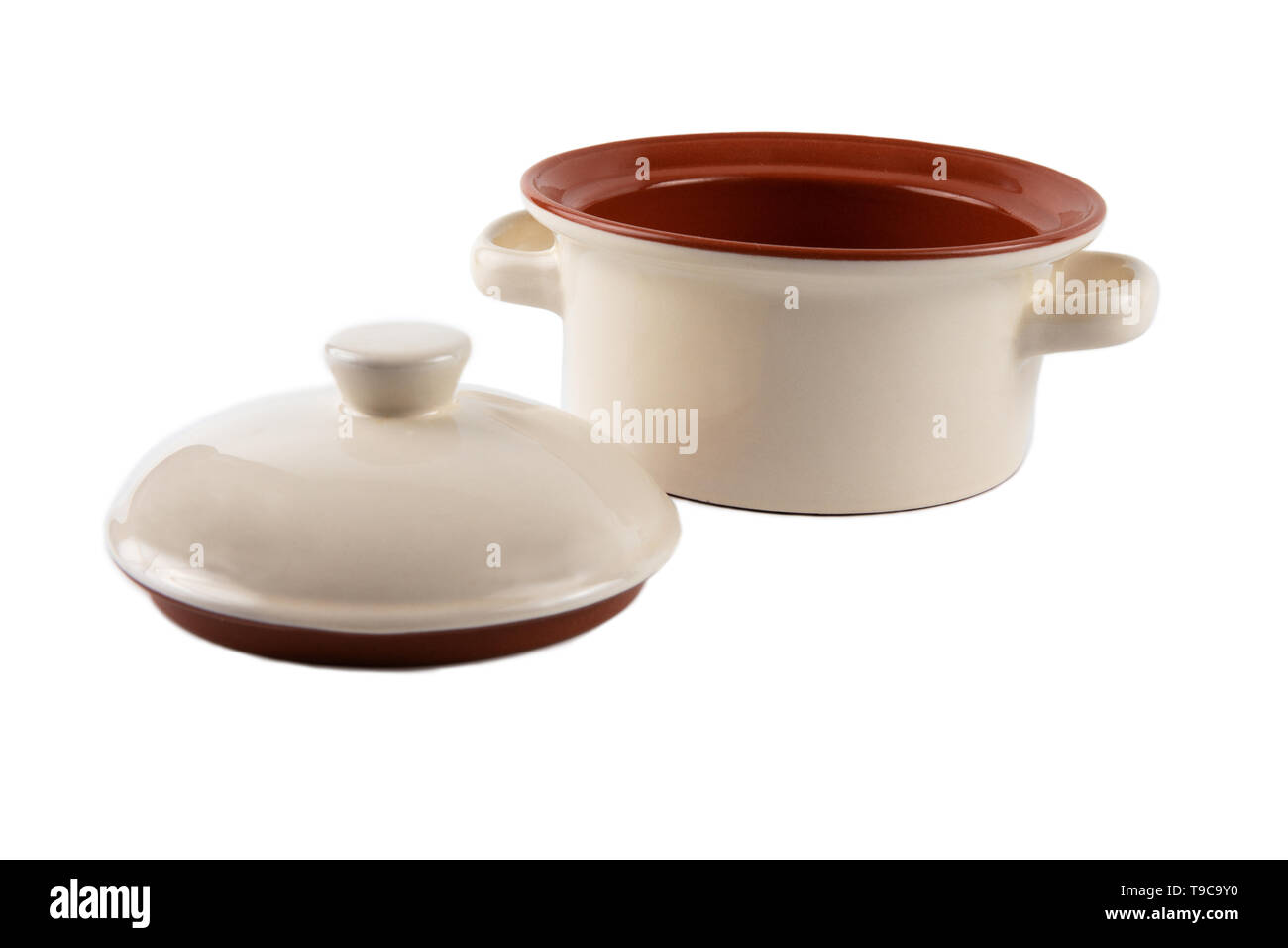 Ceramic saucepan on a white background. Front view Stock Photo - Alamy