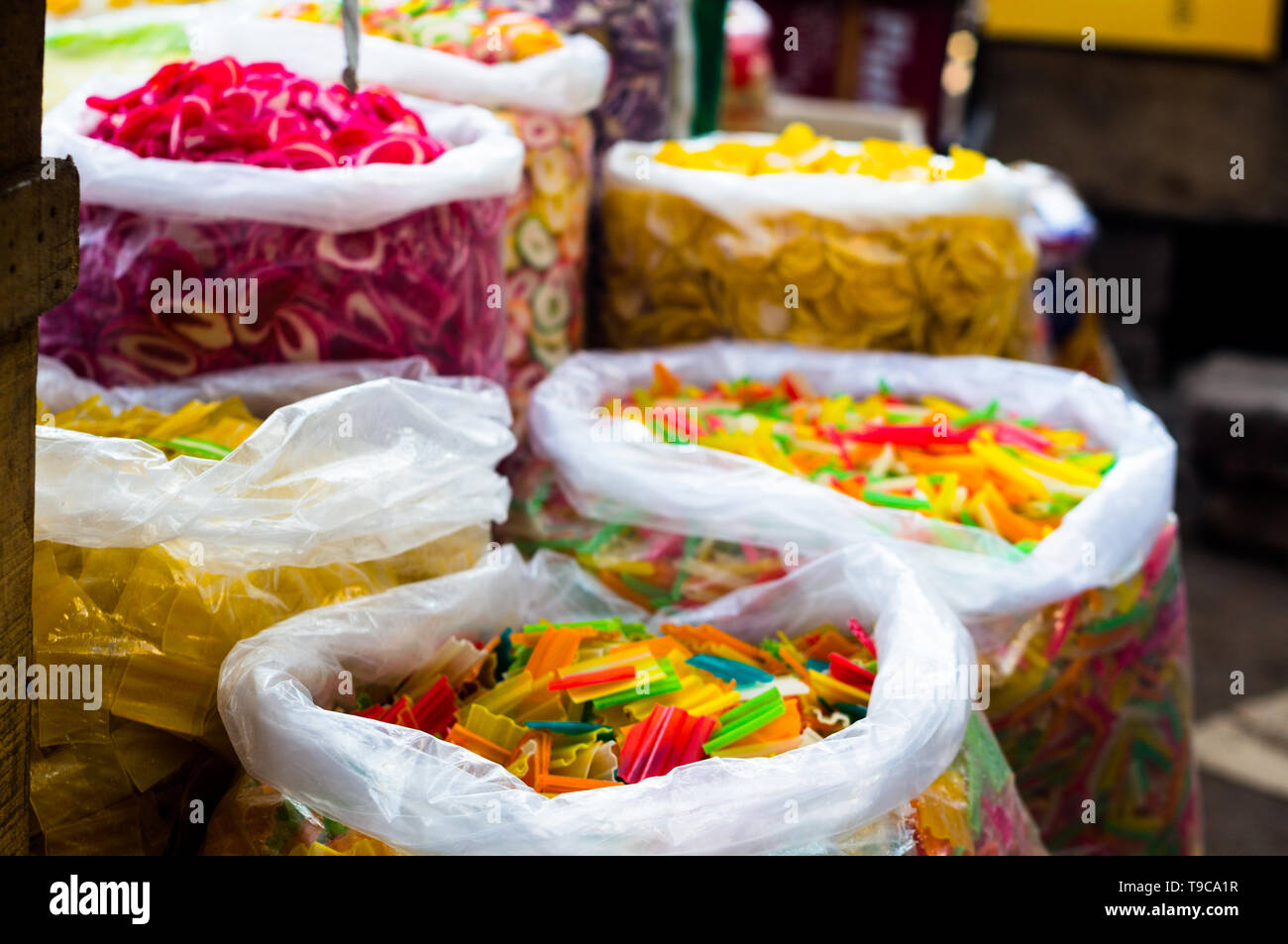 colorful variety of fryums ready to fry snacks in clear bags for sale ...