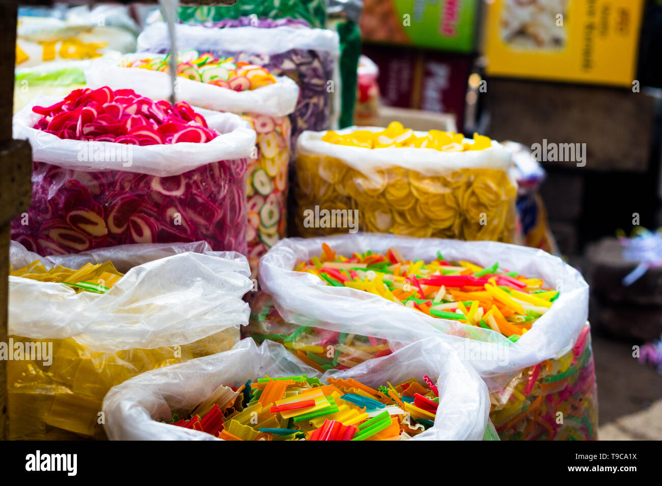 colorful variety of fryums ready to fry snacks in clear bags for sale ...