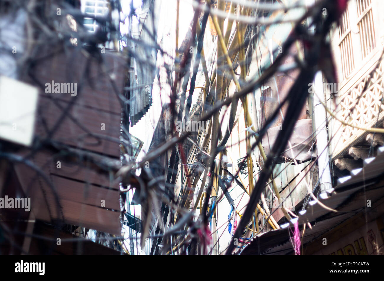 Tangled messy electrical wires on pole posing a safety hazard Stock ...