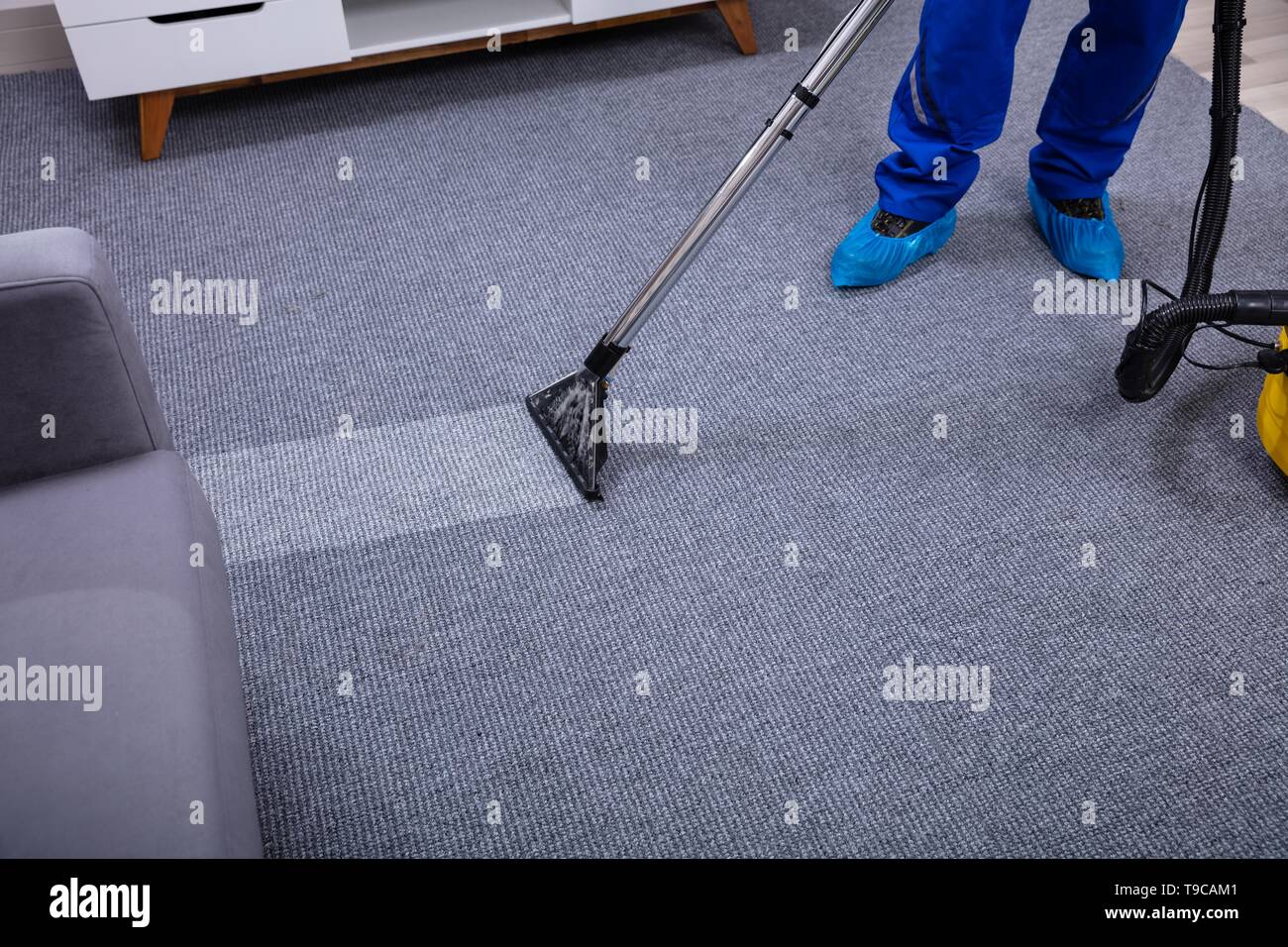 Man cleaning apartment vacuum cleaner hi-res stock photography and ...