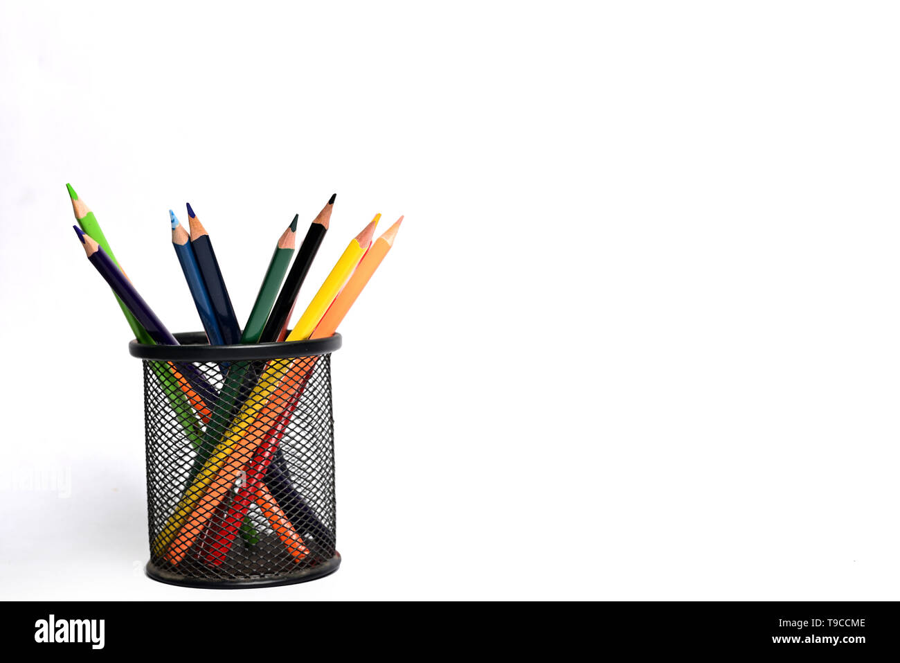 Pencil container with pencils isolated on white background Stock Photo ...