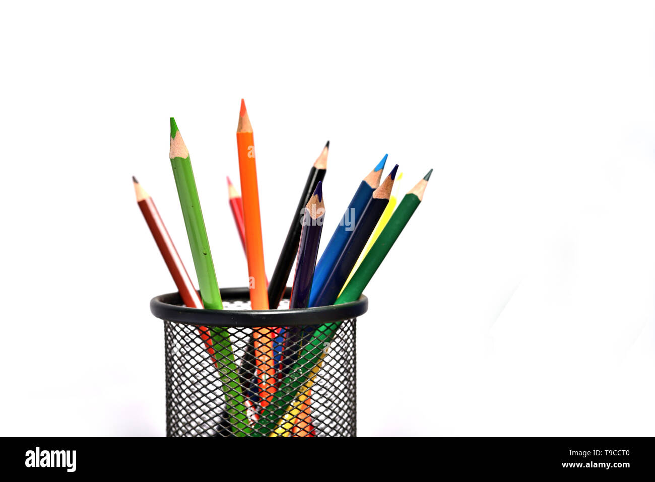 Pencil container with pencils isolated on white background Stock Photo ...