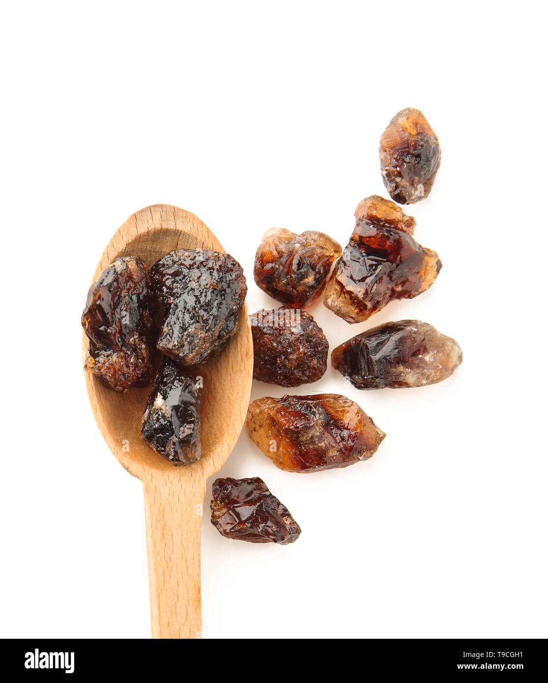 Wooden spoon with sugar on white background Stock Photo - Alamy