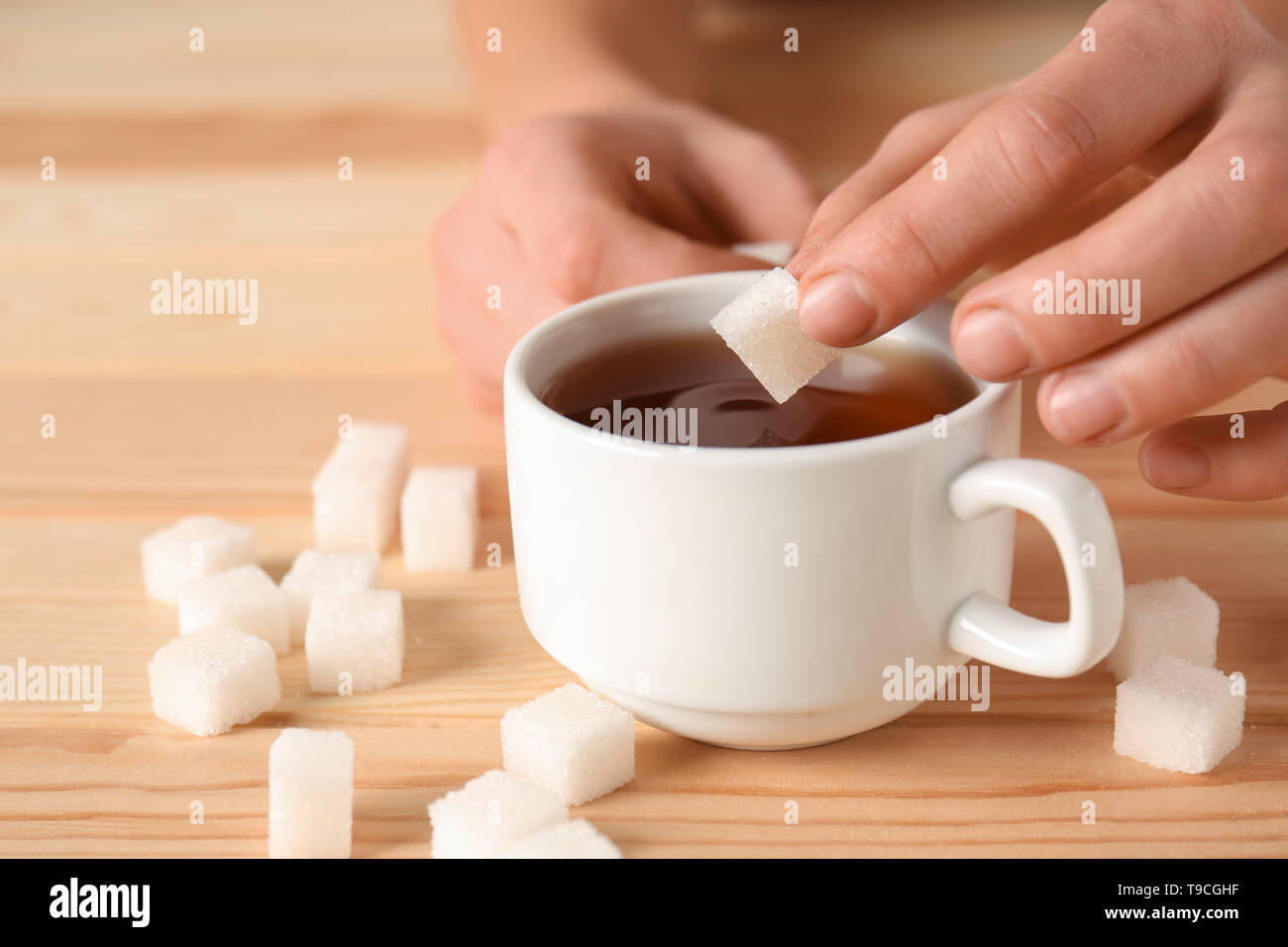 Sugar lump woman hi-res stock photography and images - Alamy