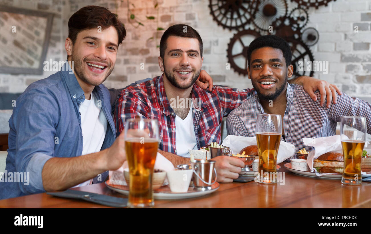 Male friends meeting talking in hi-res stock photography and images - Alamy