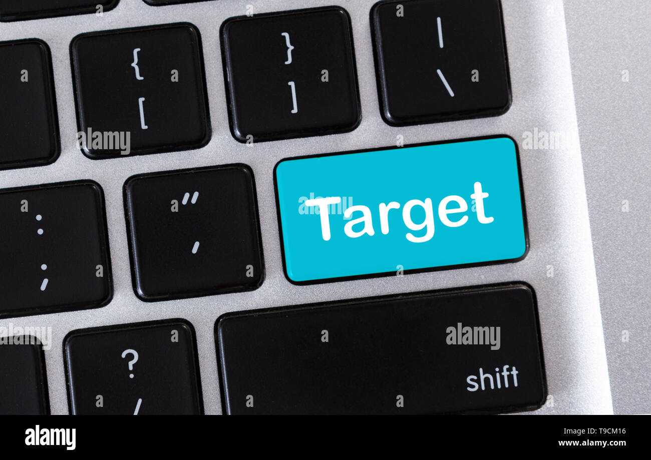 Target word on blue button of computer keypad Stock Photo - Alamy