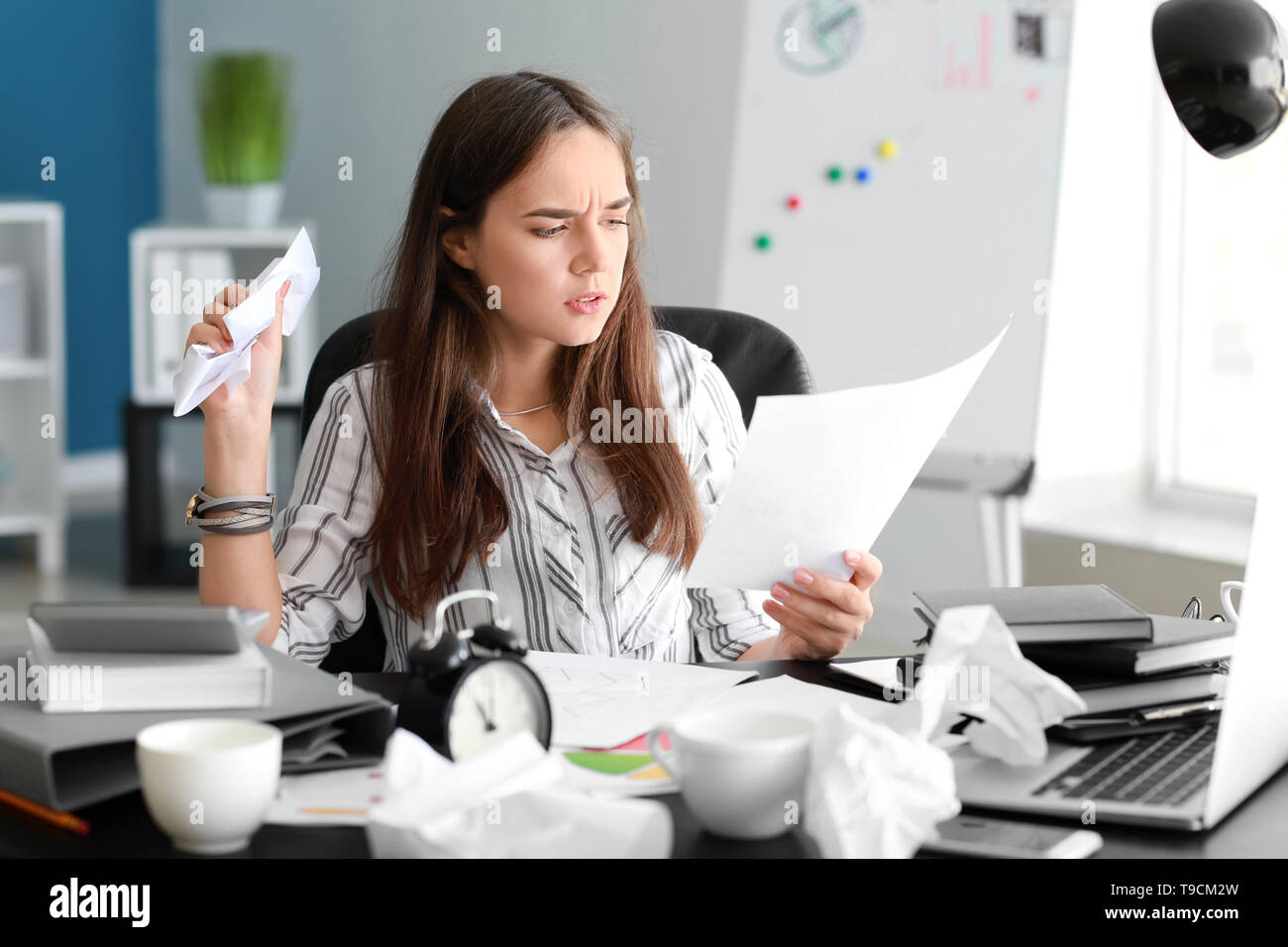 Emotional businesswoman crumpled paper hi-res stock photography and ...