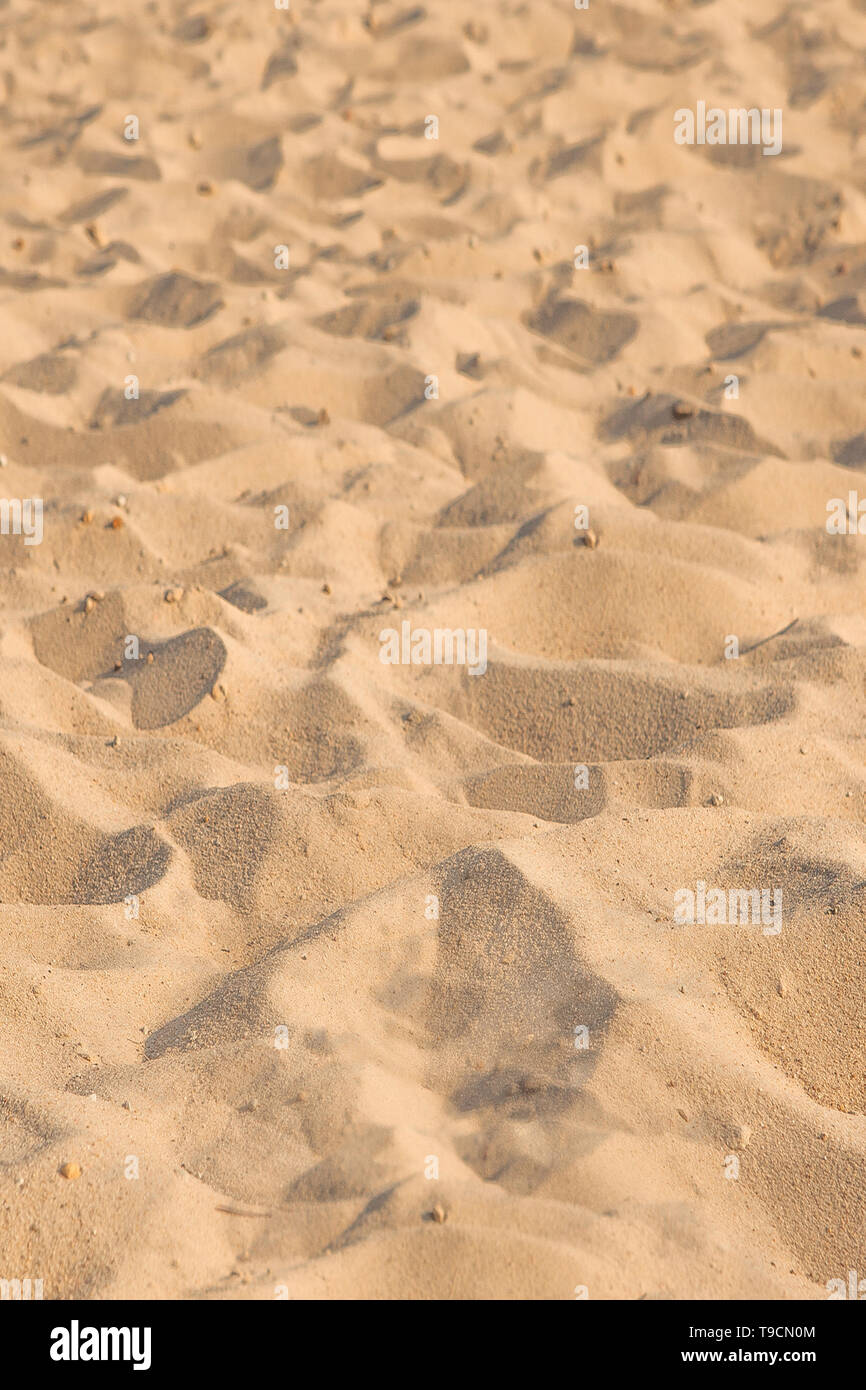 Closeup of sand pattern of a beach in the summer. Background.concept ...