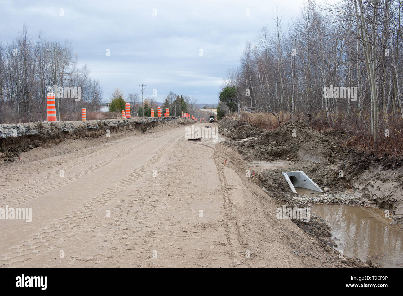 Road work where an old road is being replace by a wider and safer road ...