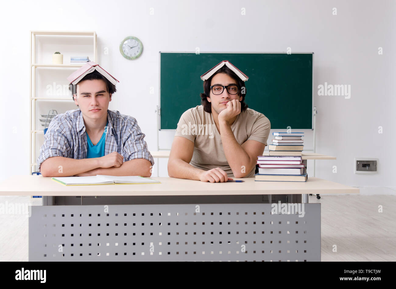 Two male students in the classroom Stock Photo - Alamy