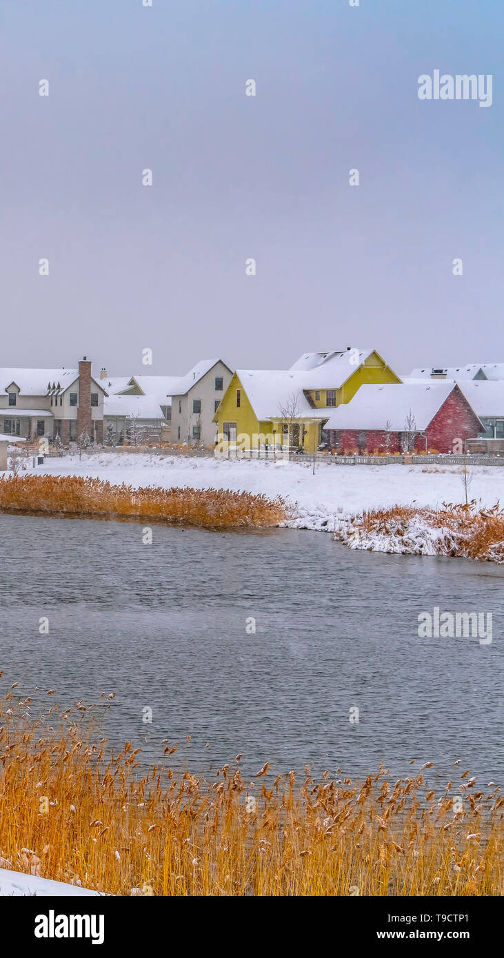 Vertical Daybreak homes around Oquirrh Lake seen in winter Stock Photo ...