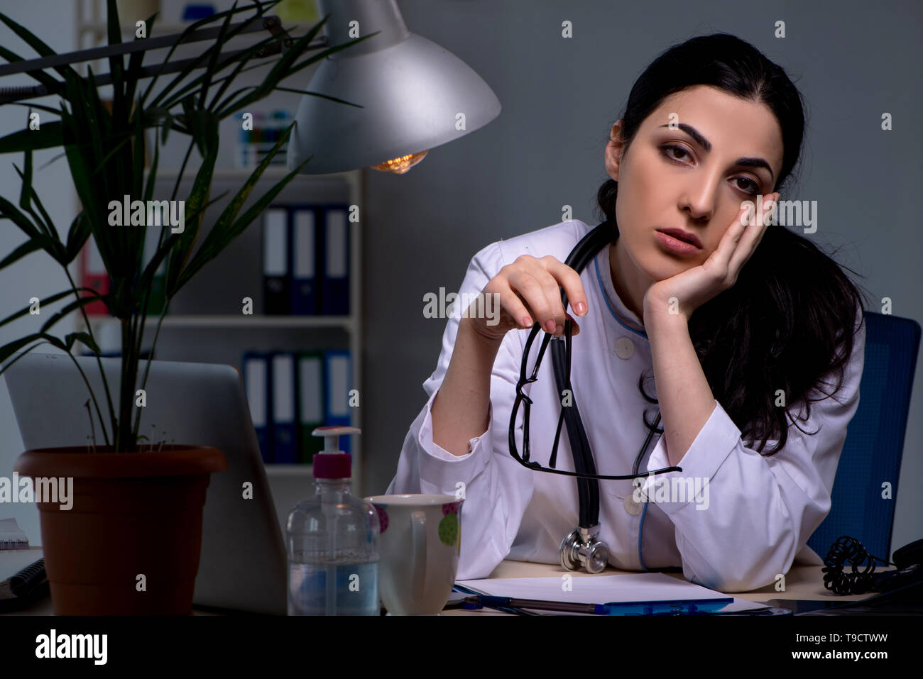 Female doctor night shift hi-res stock photography and images - Alamy