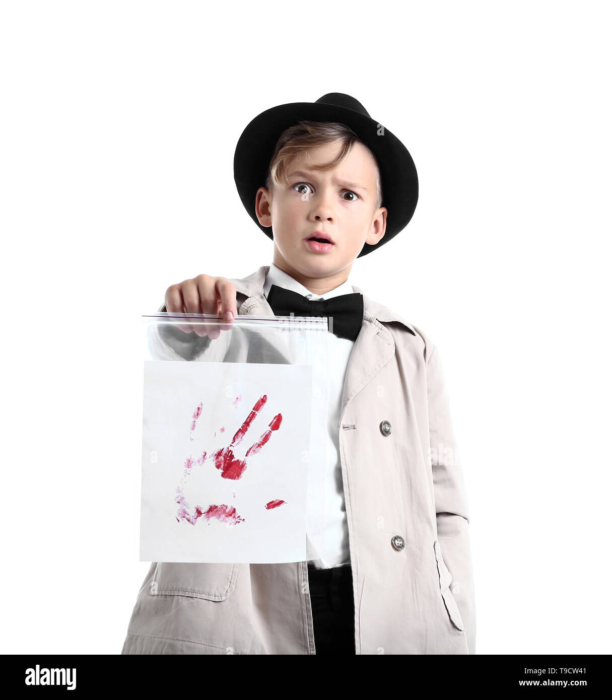 Cute little detective with evidence on white background Stock Photo - Alamy
