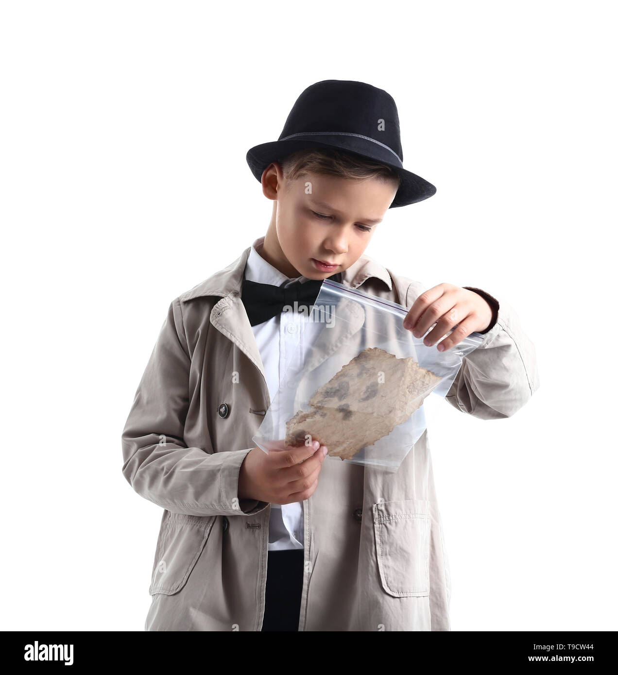 Cute little detective with evidence on white background Stock Photo - Alamy