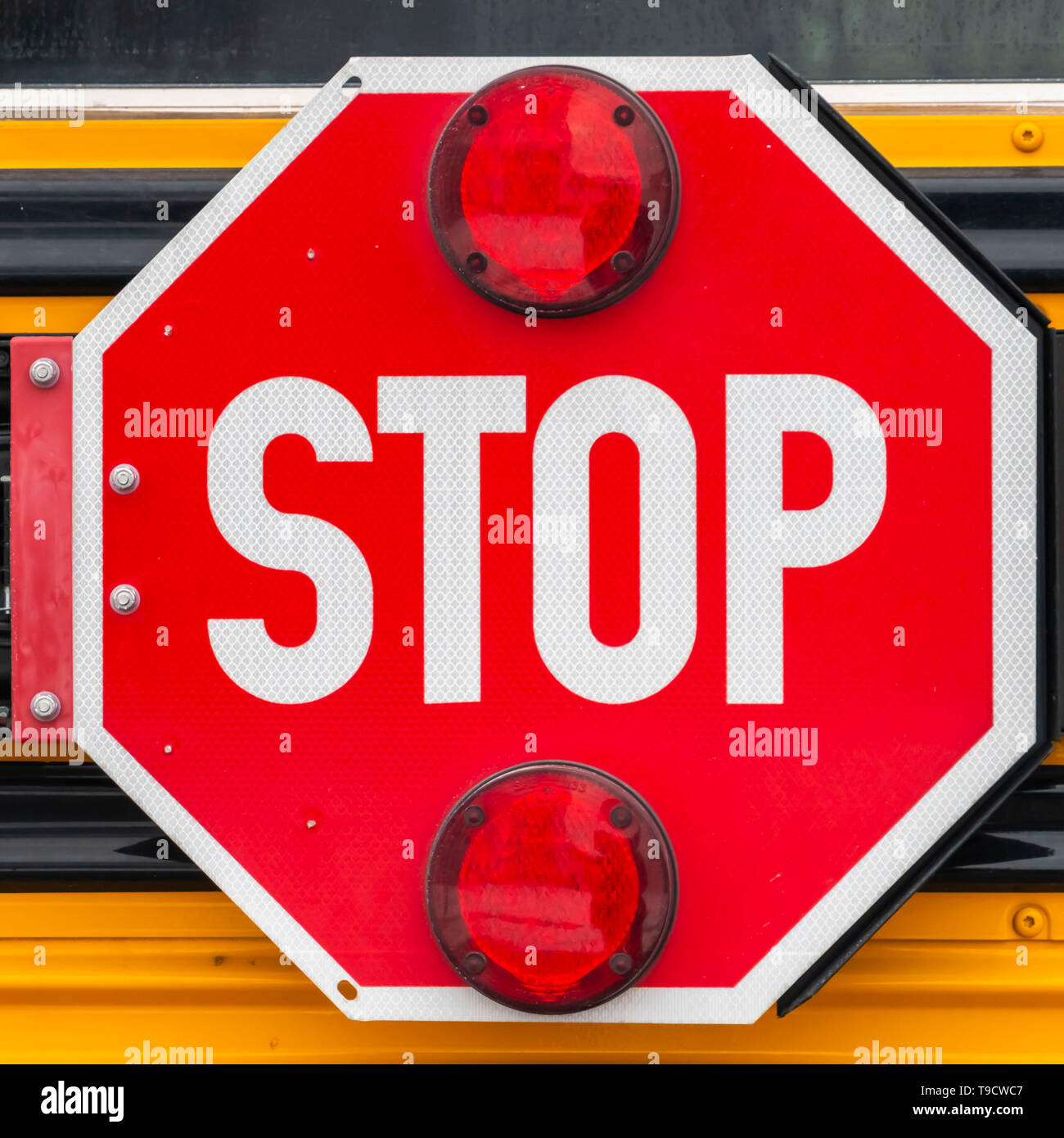 Clear Square Close up of an octagon shaped red stop sign with signal ...