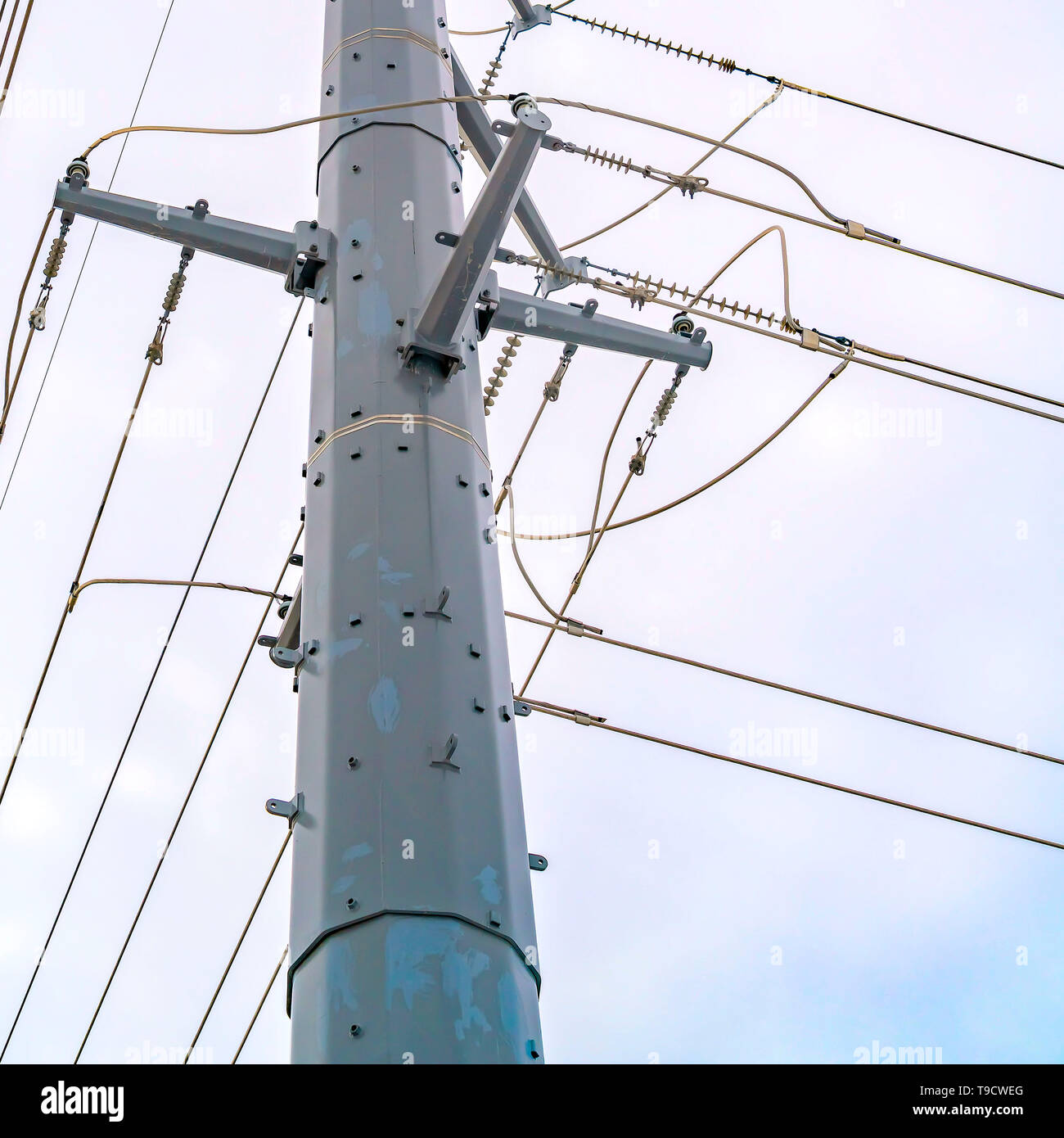 Clear Square Looking up at a towering metal post supporting overhead ...