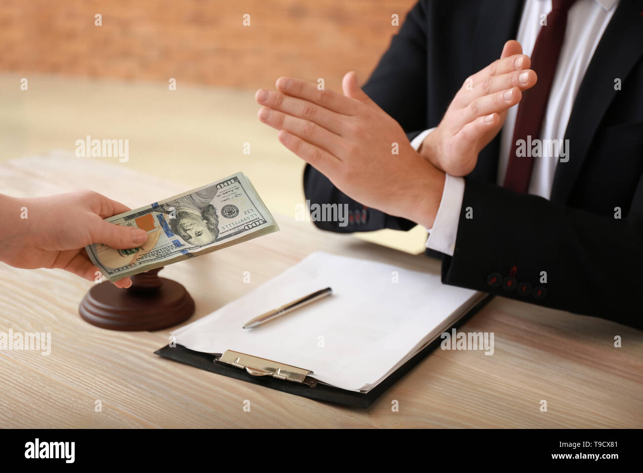 Judge refusing to take bribe. Corruption concept Stock Photo - Alamy