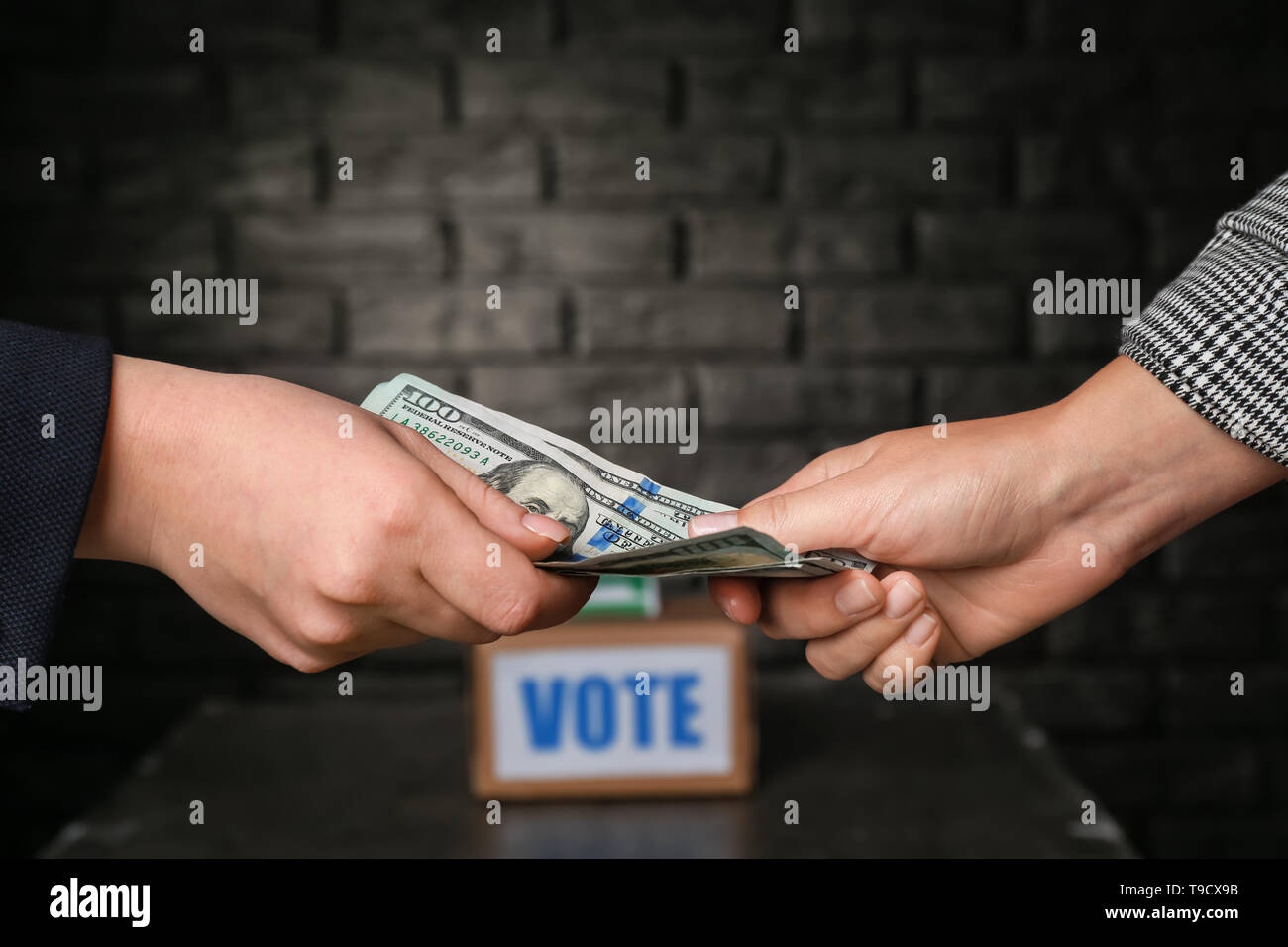 Politician taking bribe from woman on dark background. Corruption ...