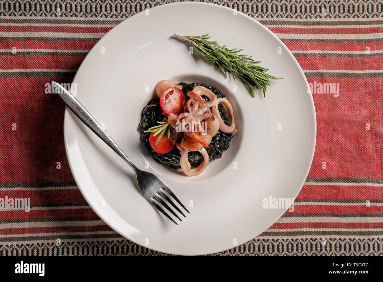 Black risotto squid on plate hi-res stock photography and images - Alamy
