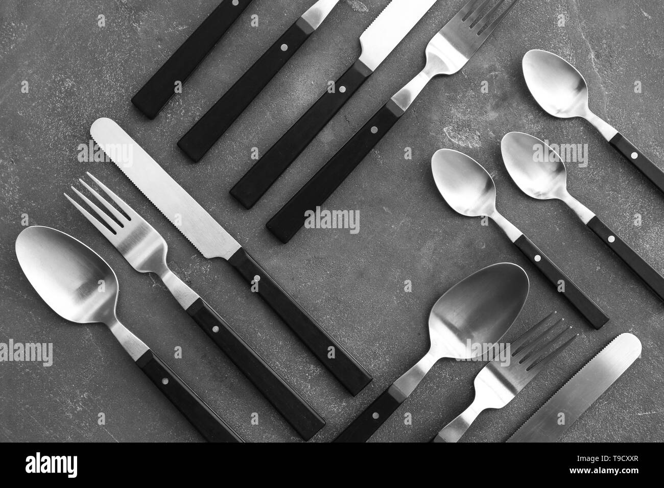Set of cutlery on grey background, flat lay Stock Photo - Alamy