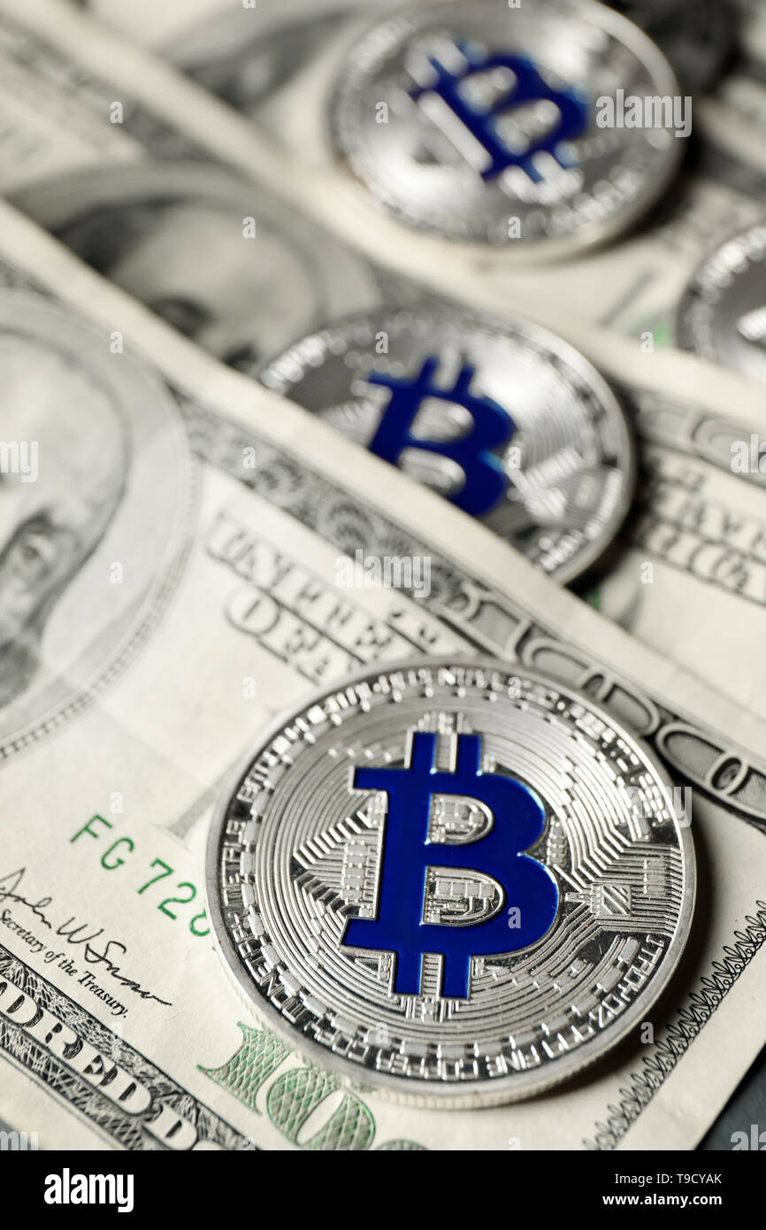 Silver bitcoins dollar bills hi-res stock photography and images - Alamy