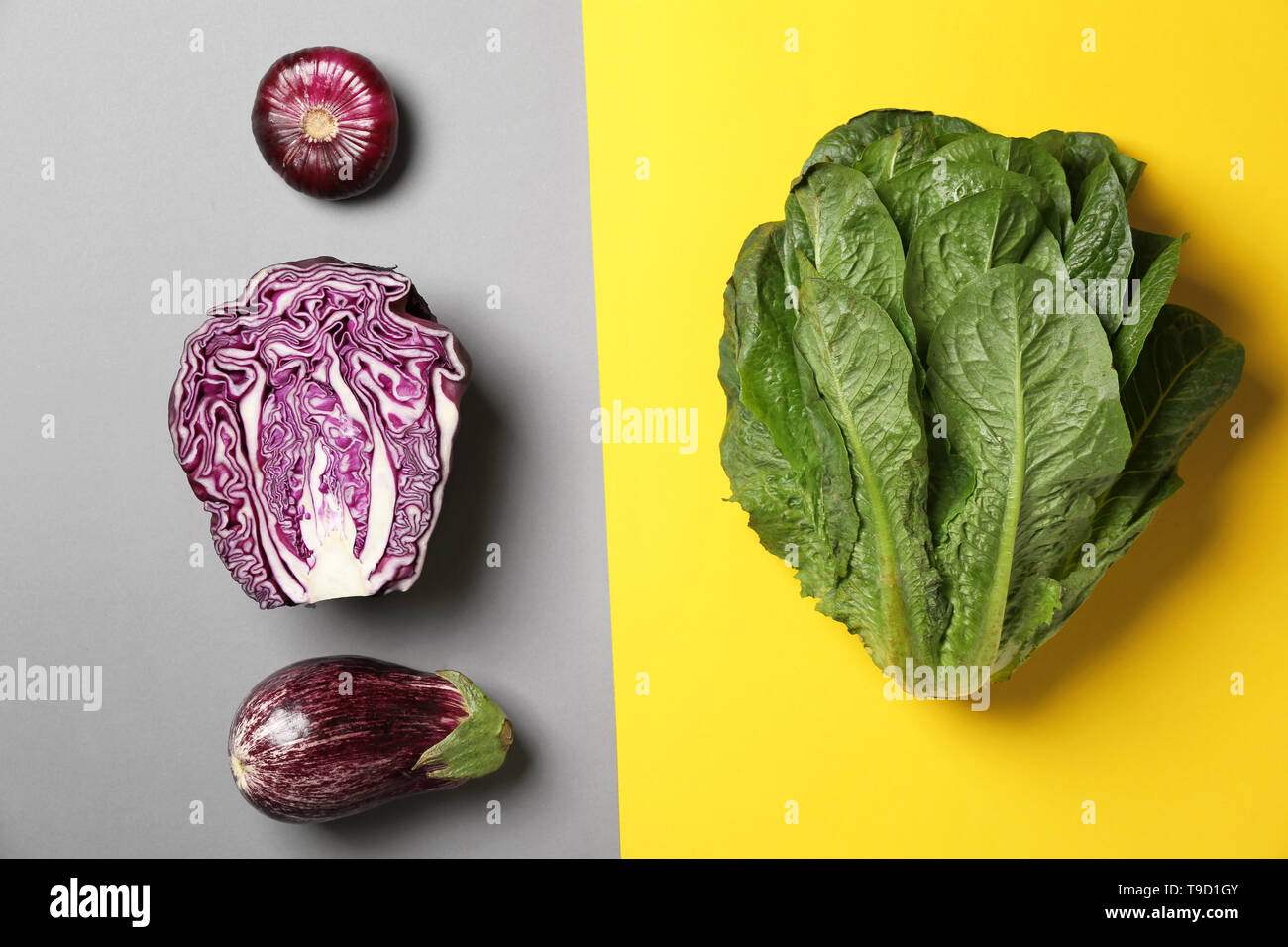 Different fresh vegetables on color background Stock Photo - Alamy