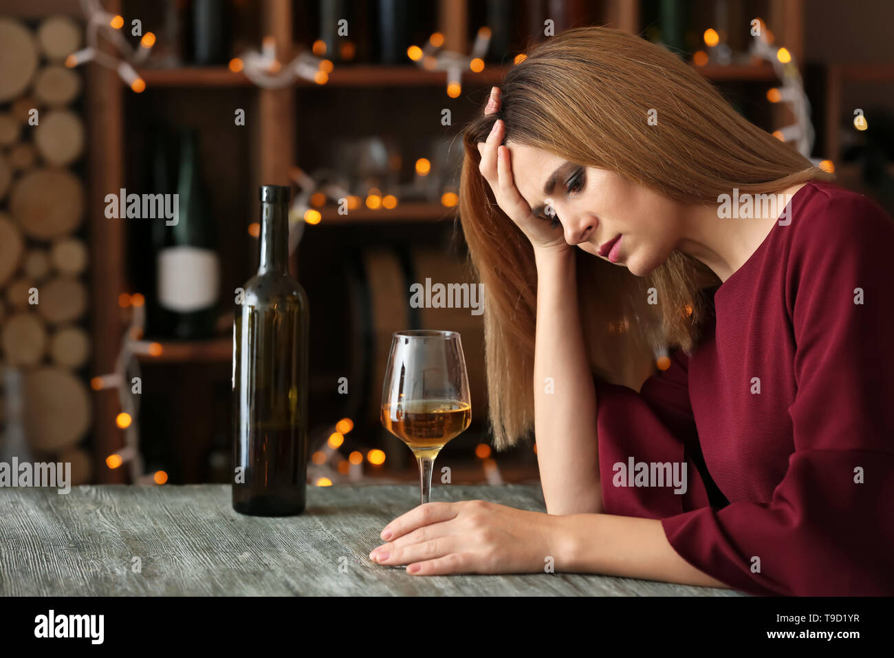 Woman in bar sad hi-res stock photography and images - Alamy
