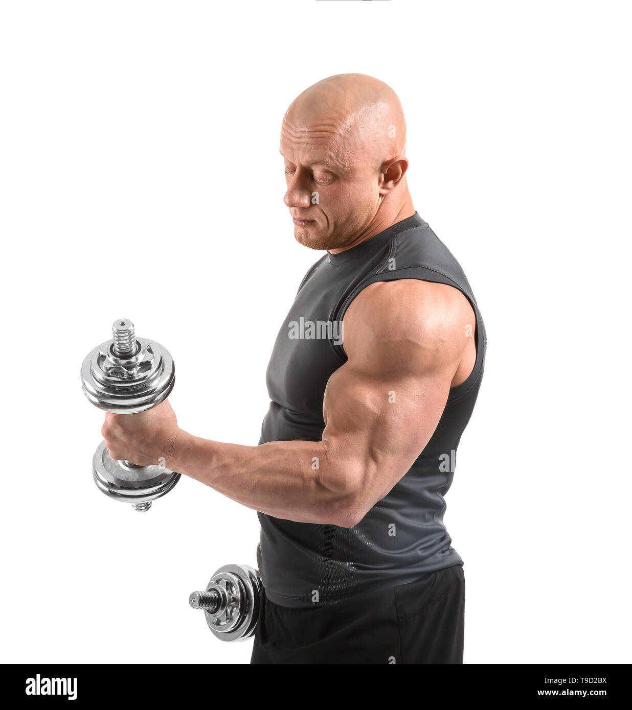 Muscular bodybuilder with dumbbells on white background Stock Photo - Alamy