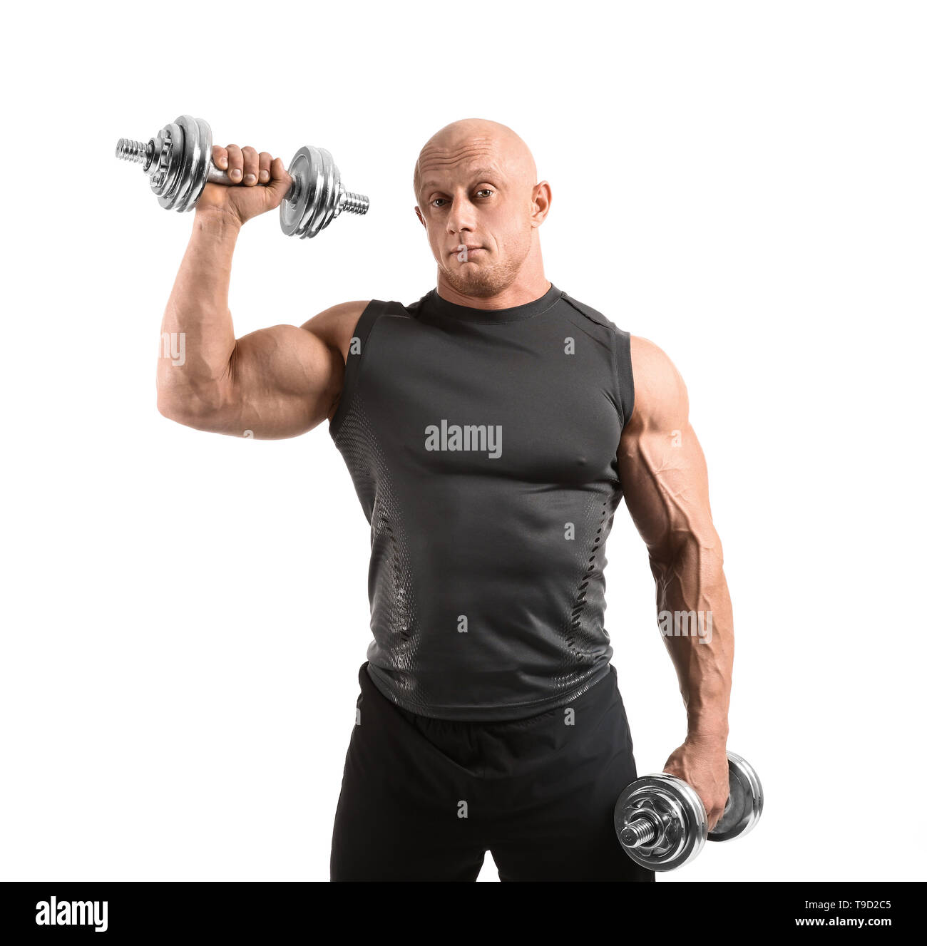 Muscular bodybuilder with dumbbells on white background Stock Photo - Alamy