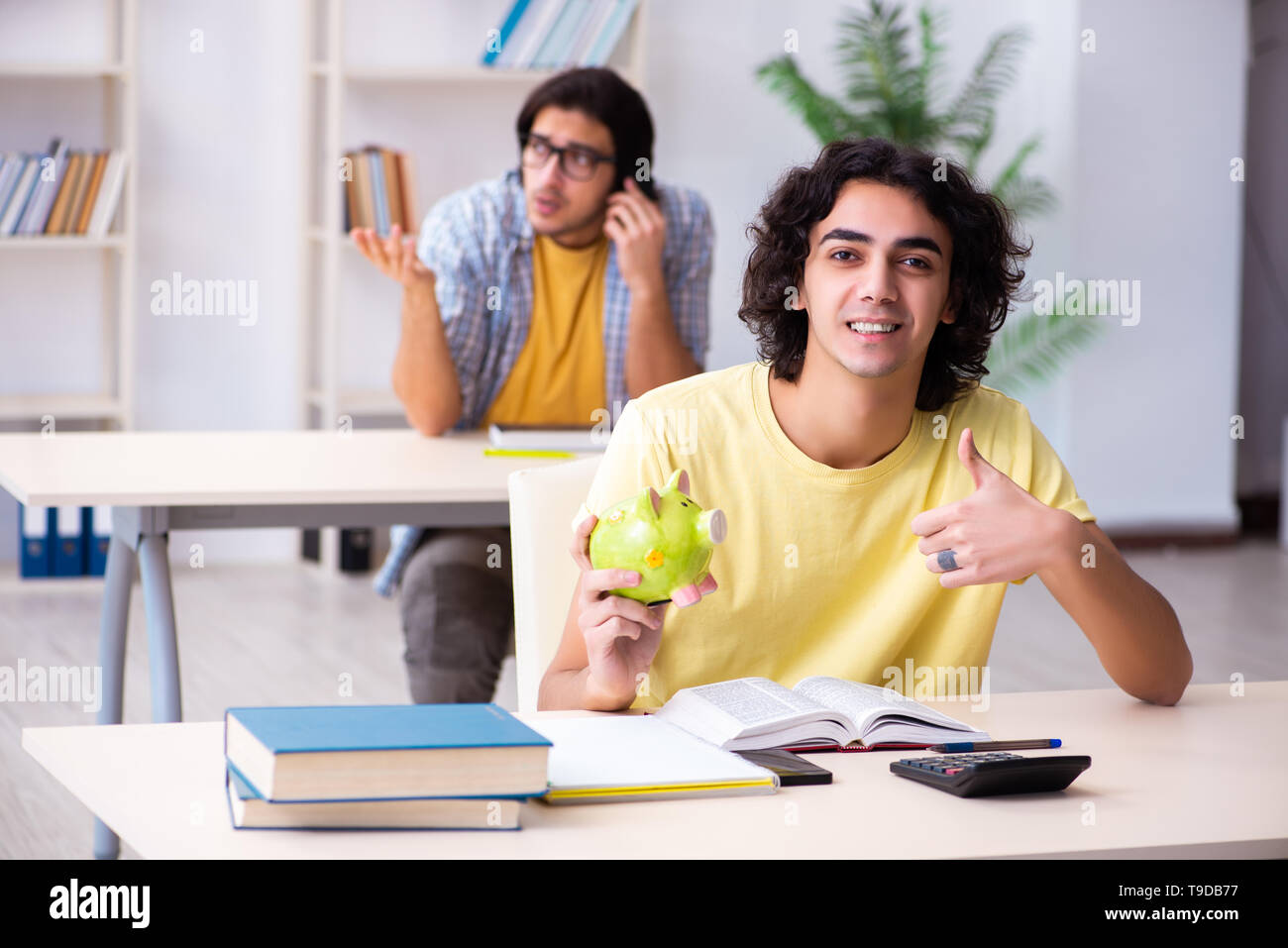 Two male students in the classroom Stock Photo - Alamy