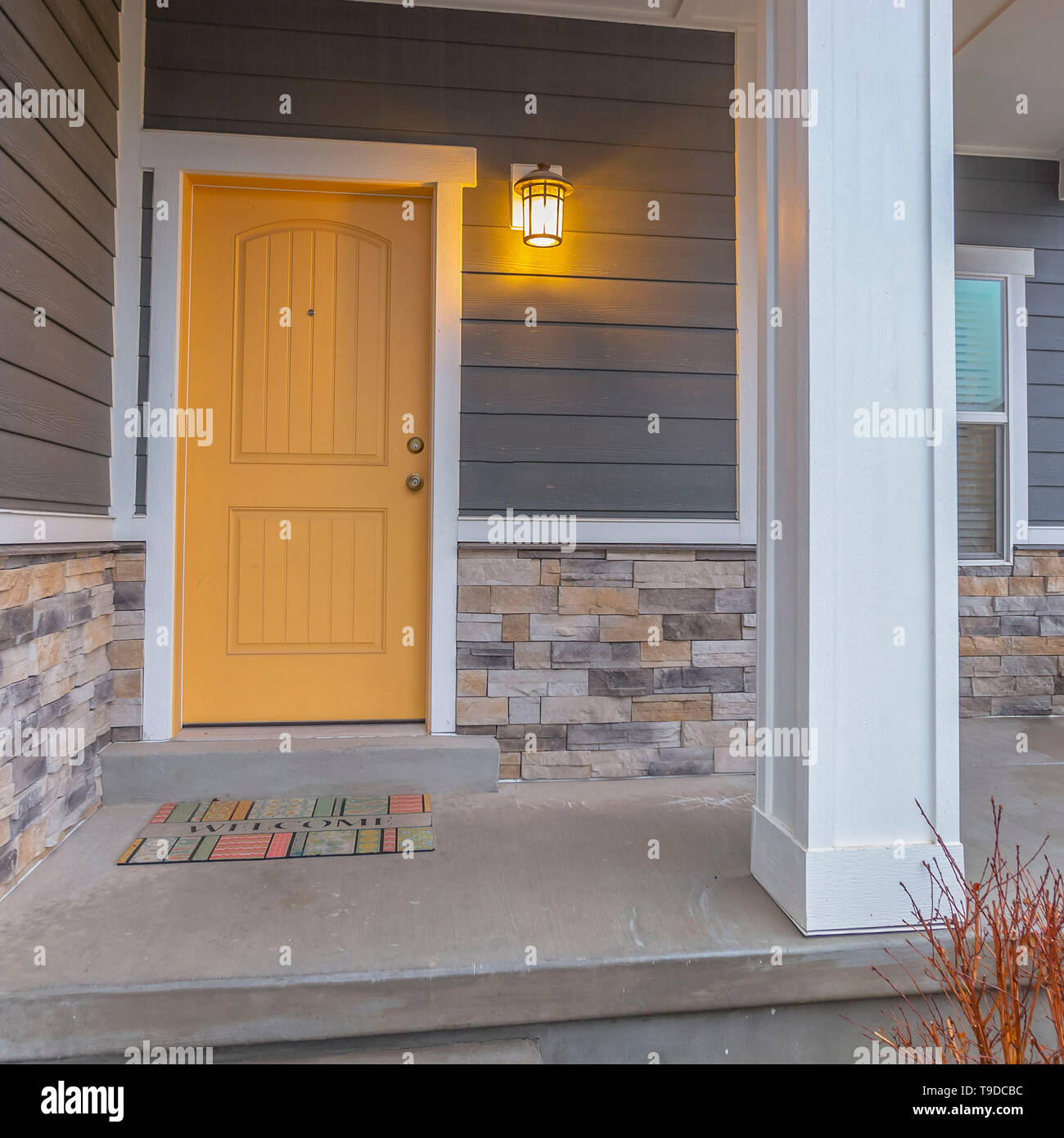 Square Entryway of a home with stairs going up to the front porch and ...