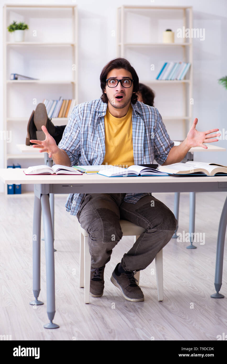 Two male students in the classroom Stock Photo - Alamy