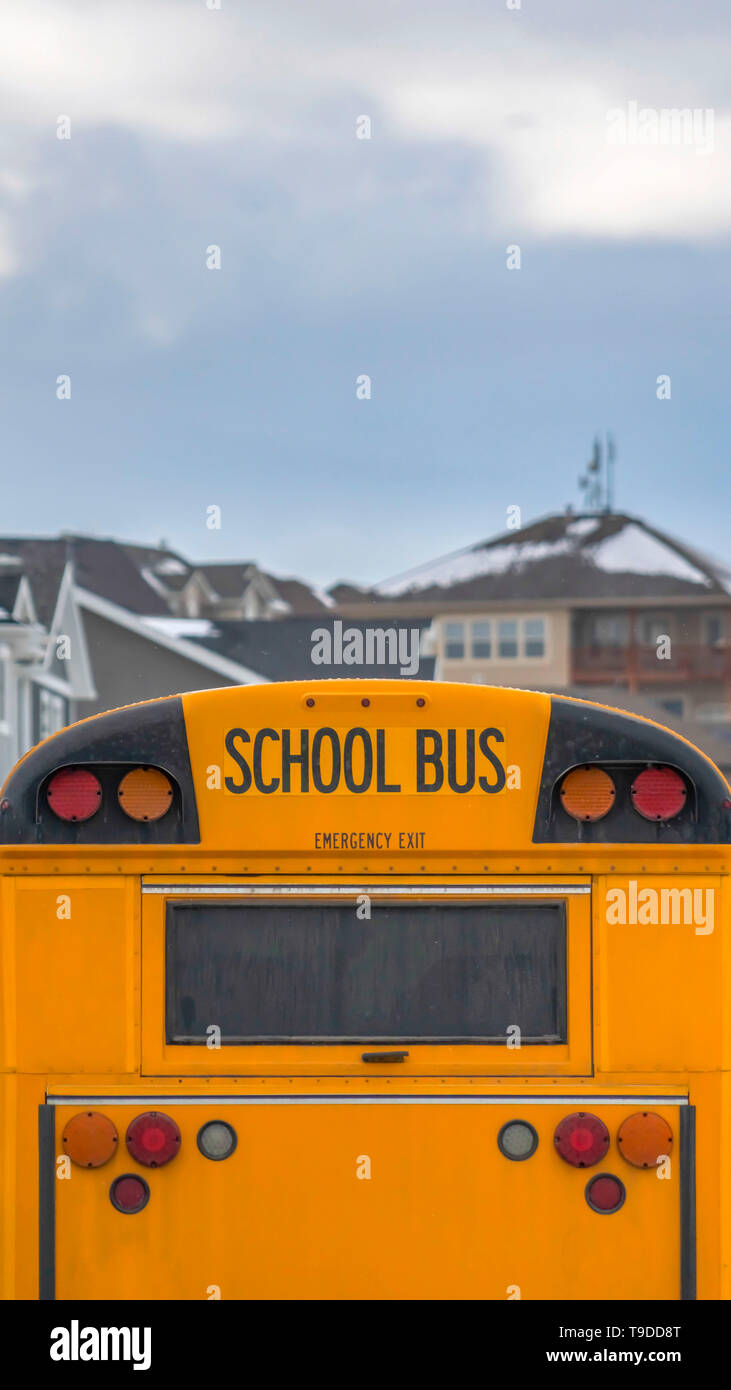 Vertical Yellow school bus with rectangular window and several signal ...