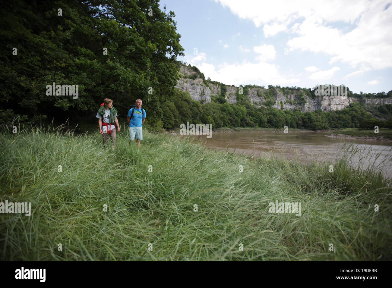 Two male climbers celebrate their successful climb at Lancaut cliffs on ...