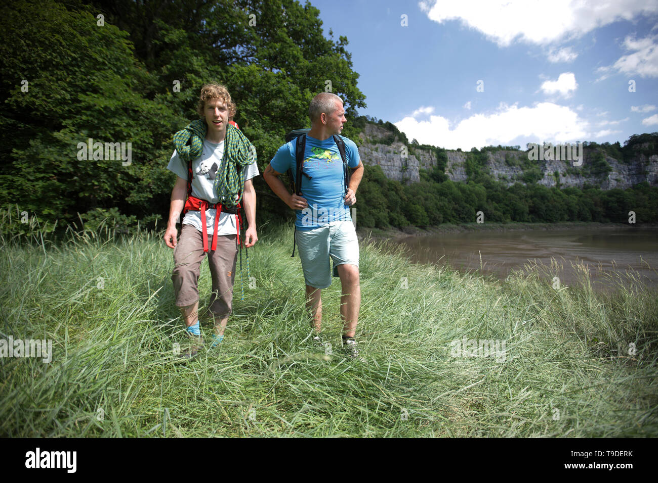 Two male climbers celebrate their successful climb at Lancaut cliffs on ...